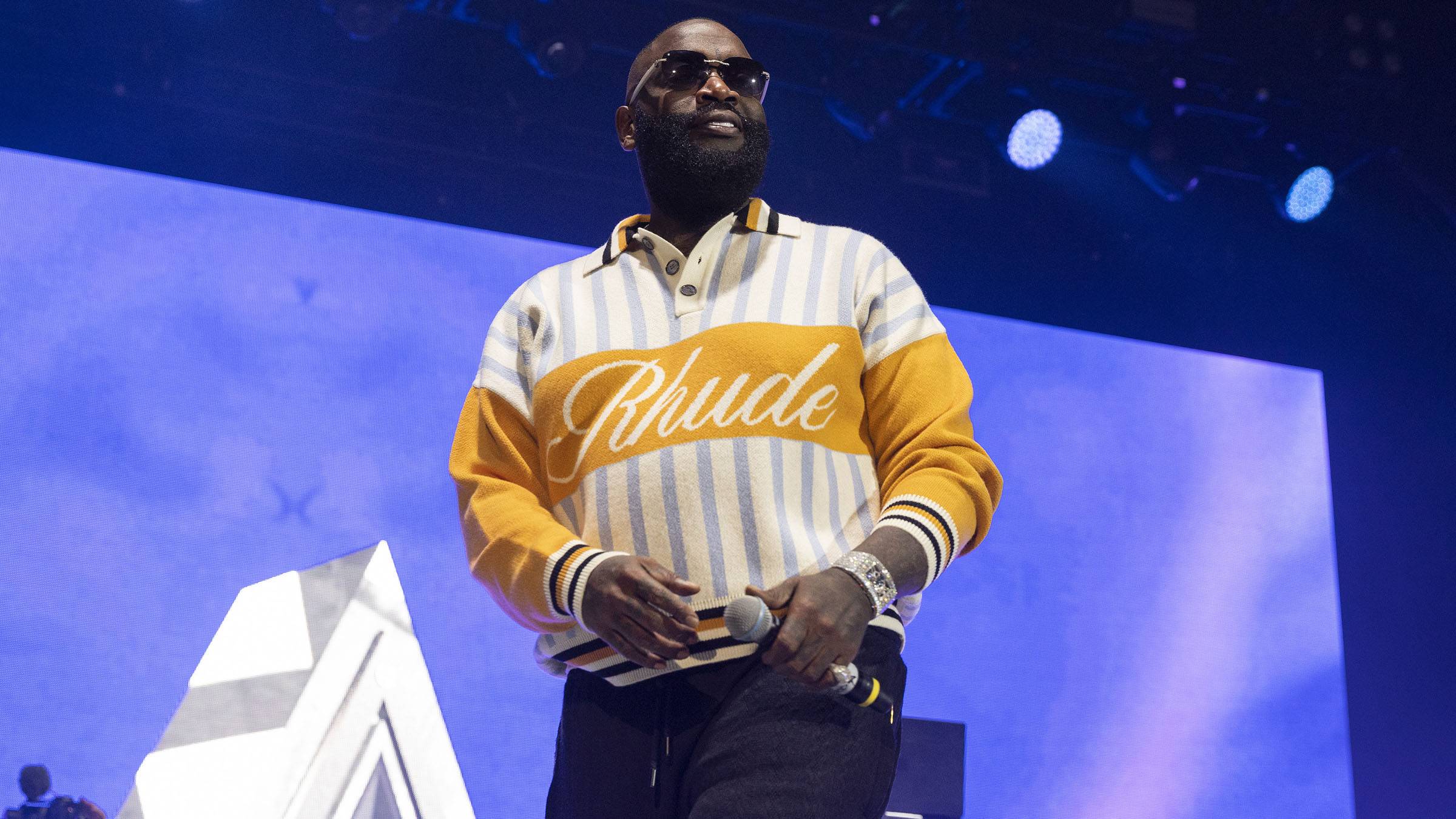Rick Ross Responds To Fan Who Parachuted Into His Car Show | News | BET