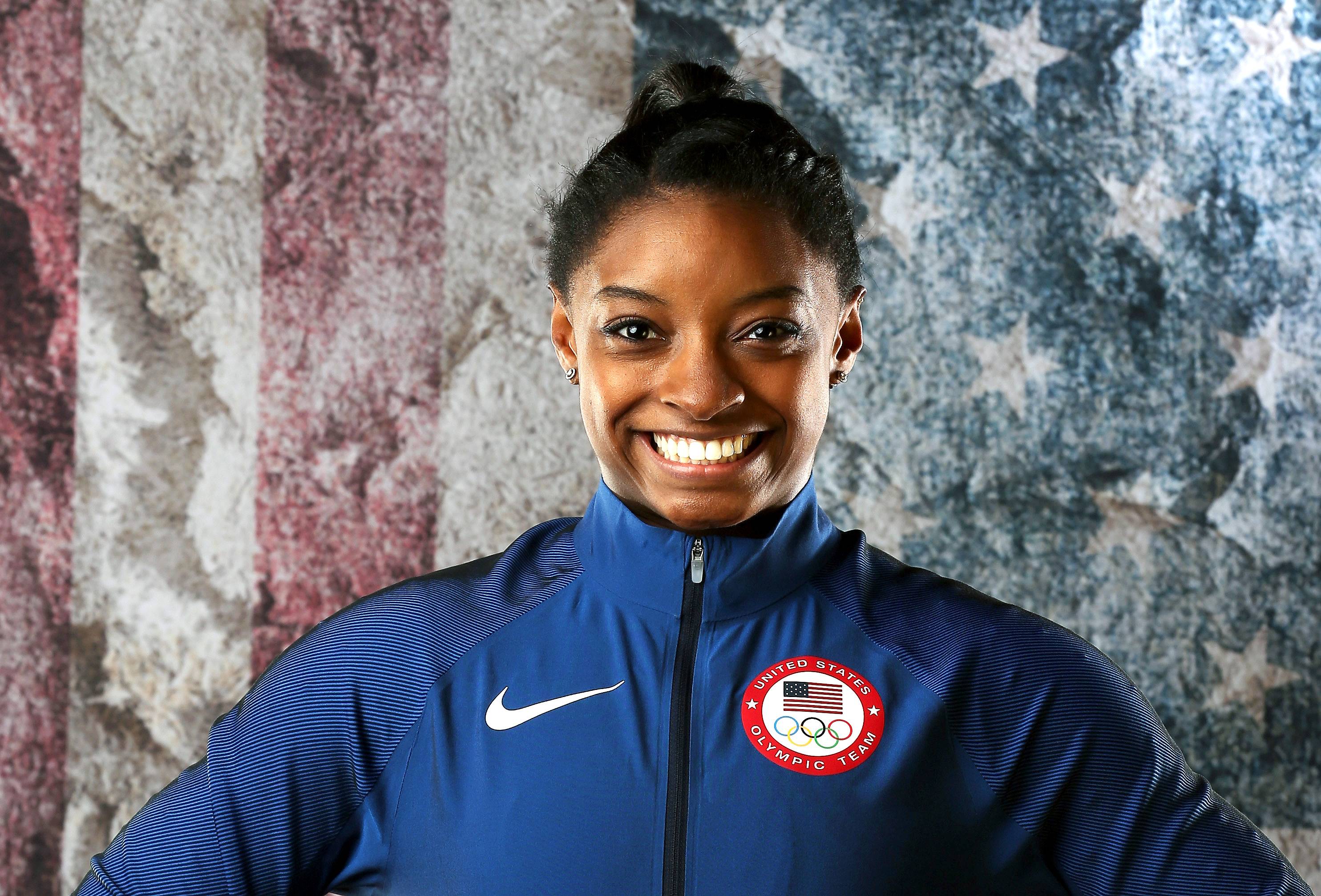 Watch: Simone Biles Flipped Out Throwing the First Pitch at a Baseball ...