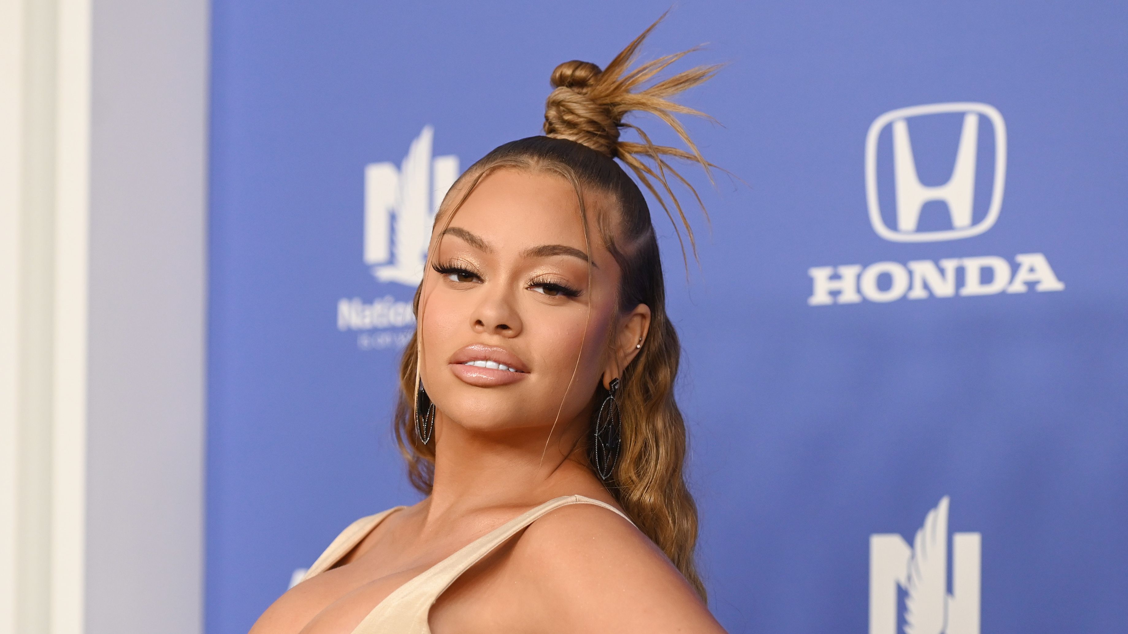 Latto Admits She Would Rather Workout With Trainer Than Get More ...