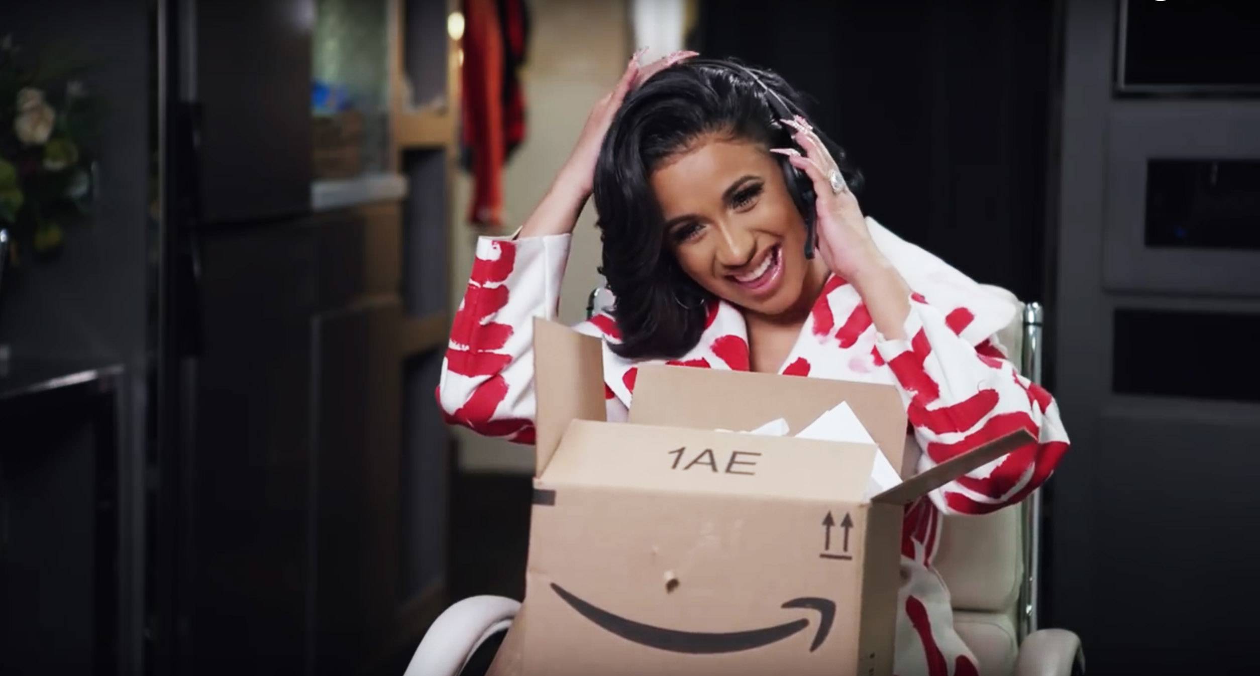 Watch Cardi B Slay A Sexy Trench While Nailing Her Role As A Personal ...