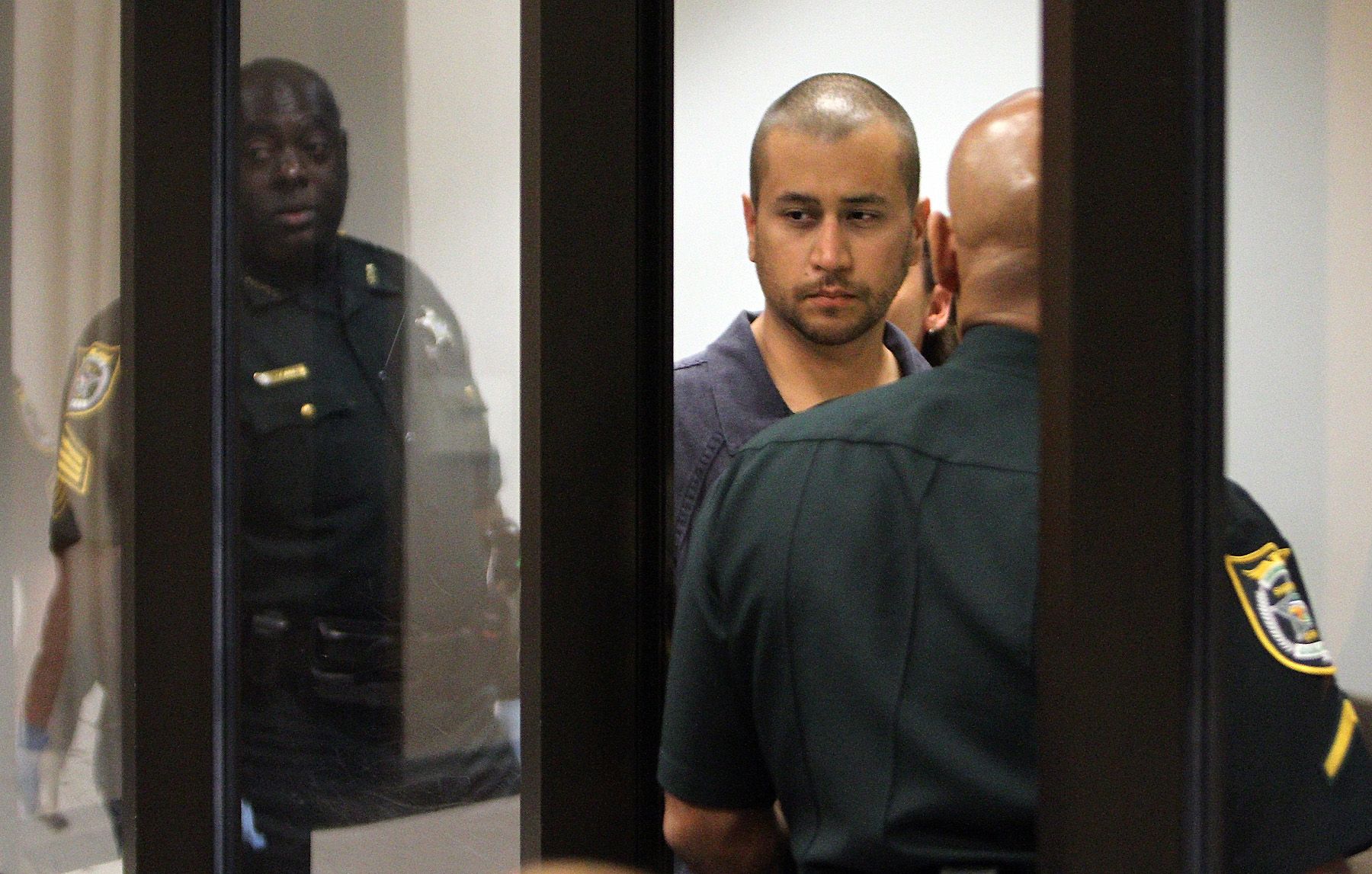 George Zimmerman Taken into - Image 14 from Turning Points: The Trayvon ...