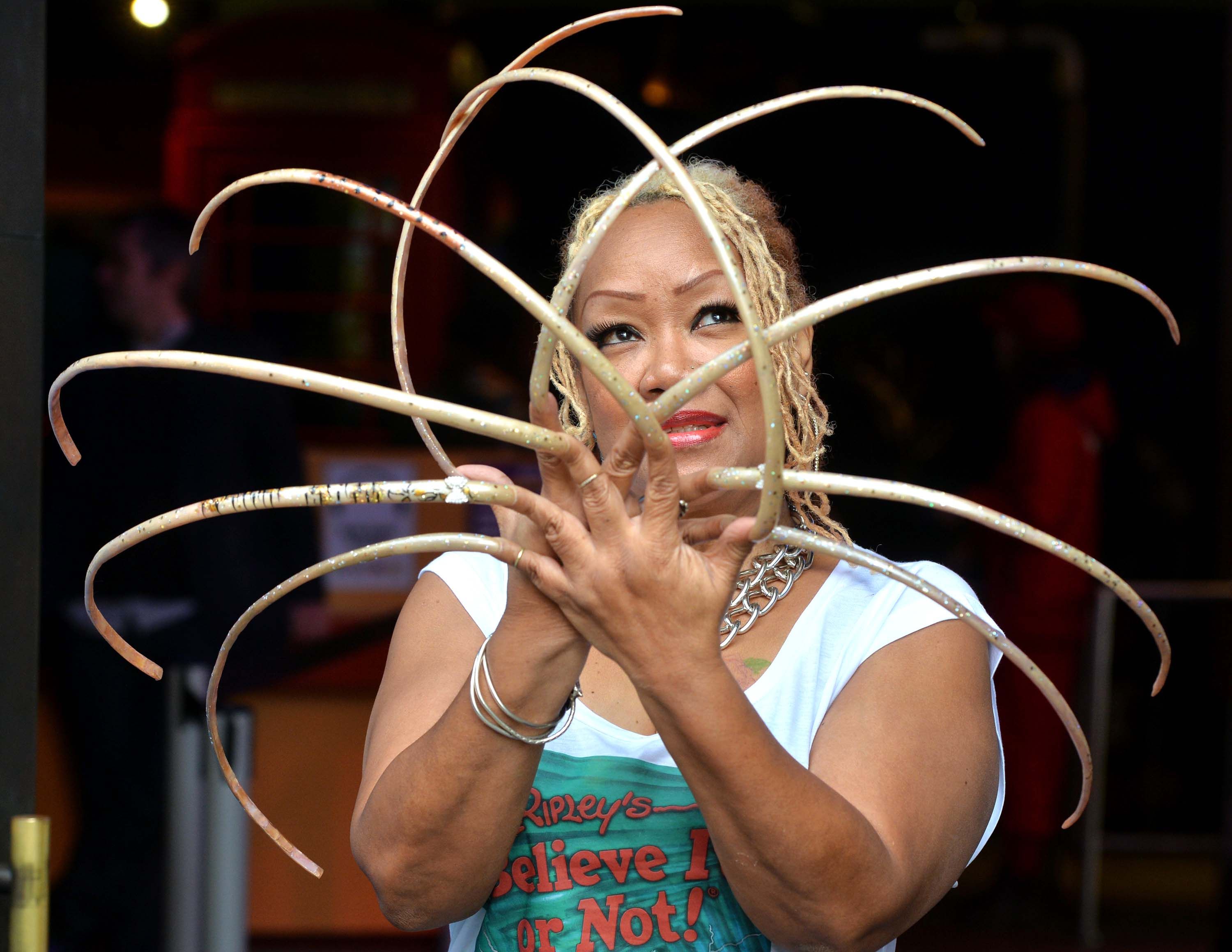 See This Texan Woman’s Insane 18-Foot Fingernails | News | BET