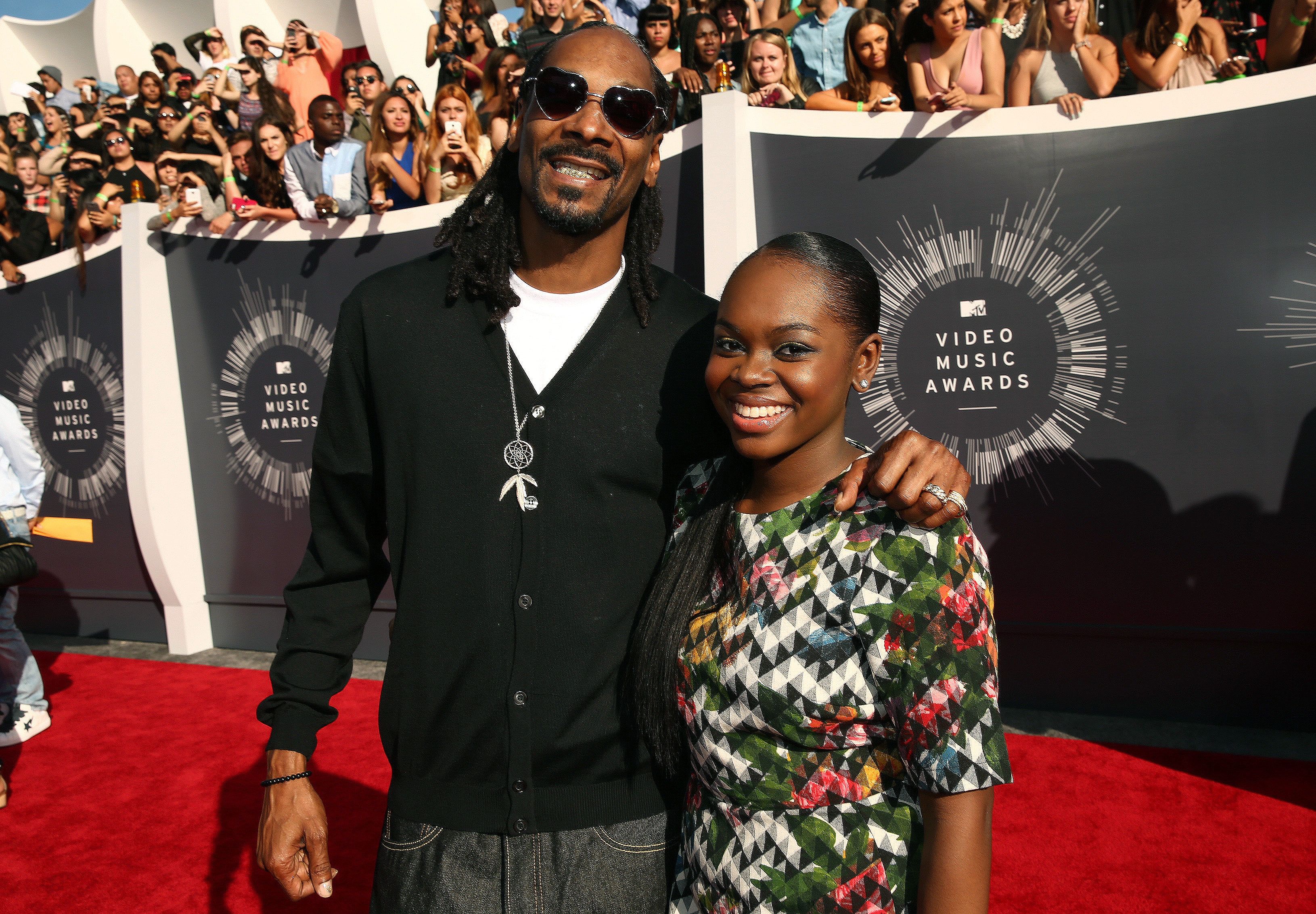 Watch Snoop Dogg Be a Proud Dad at His Daughter's Graduation | News | BET