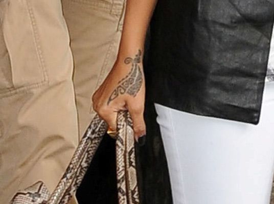 Tribal Symbol - Known - Image 10 from Rihanna: Tatt'd Up Spotlight | BET