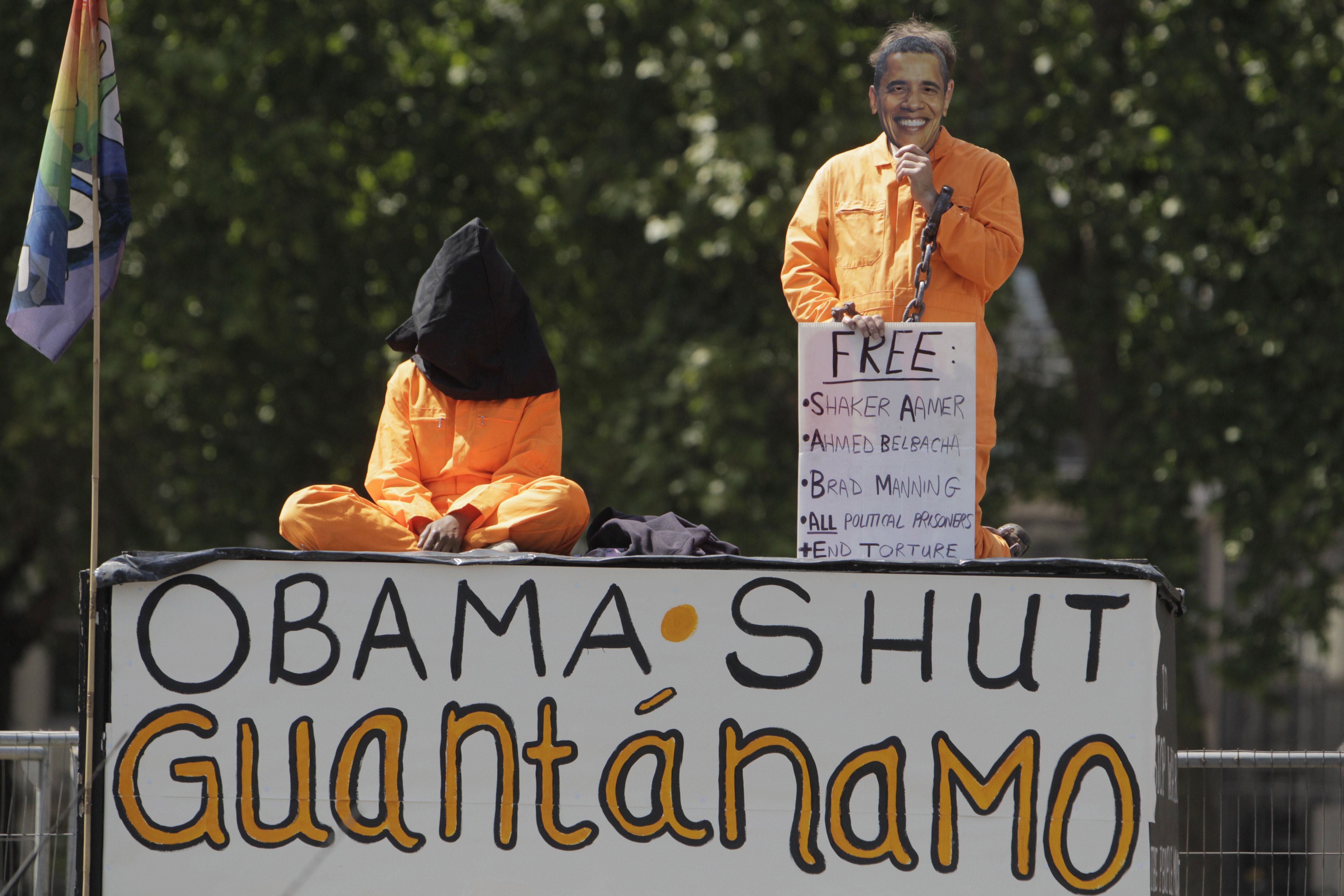 Protesters - Protesters, both - Image 34 from Photos: Obamas in Europe ...