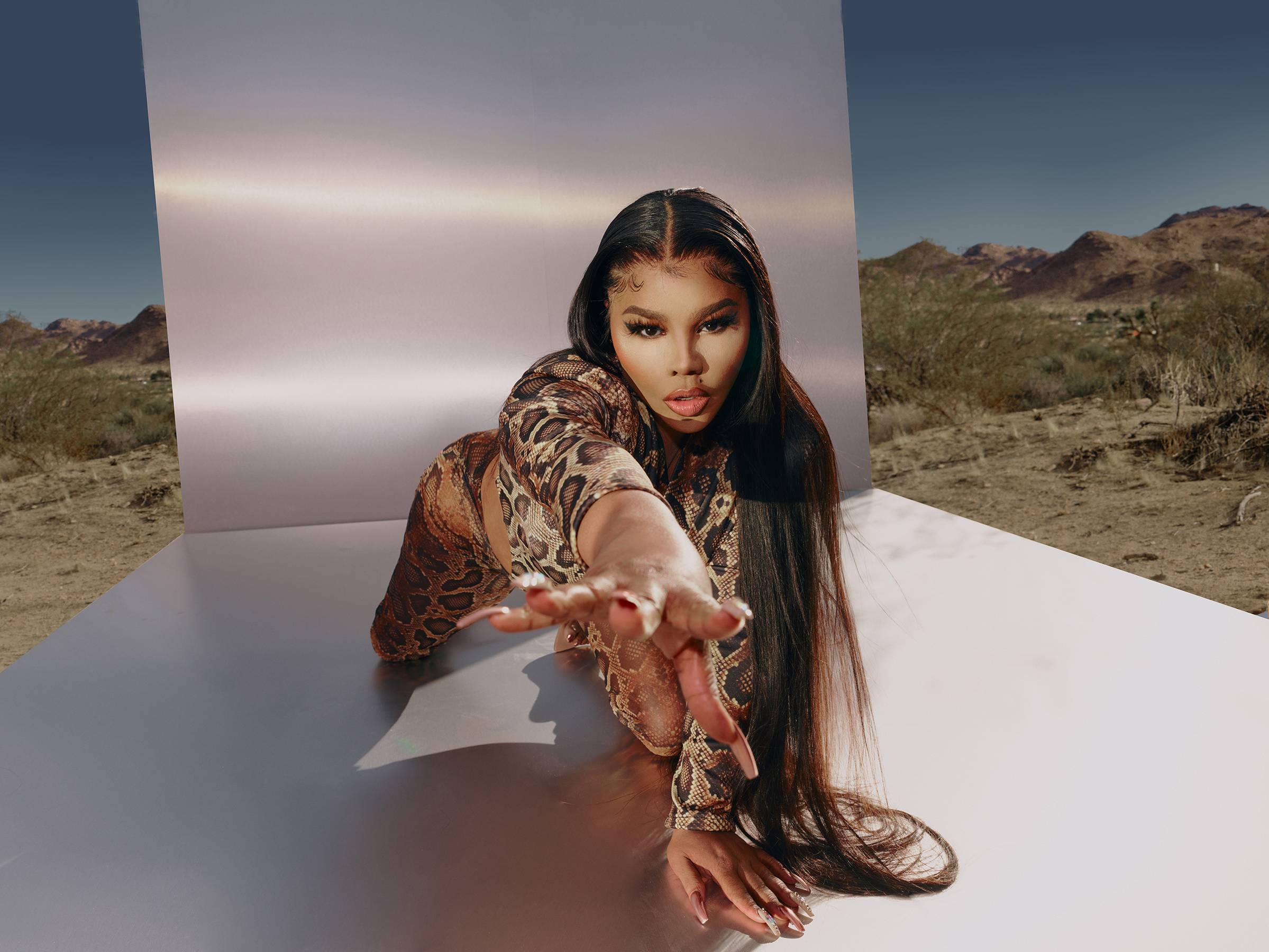 Iconic!: Lil’ Kim Breaks The Internet By Modeling Fashions From Her ...