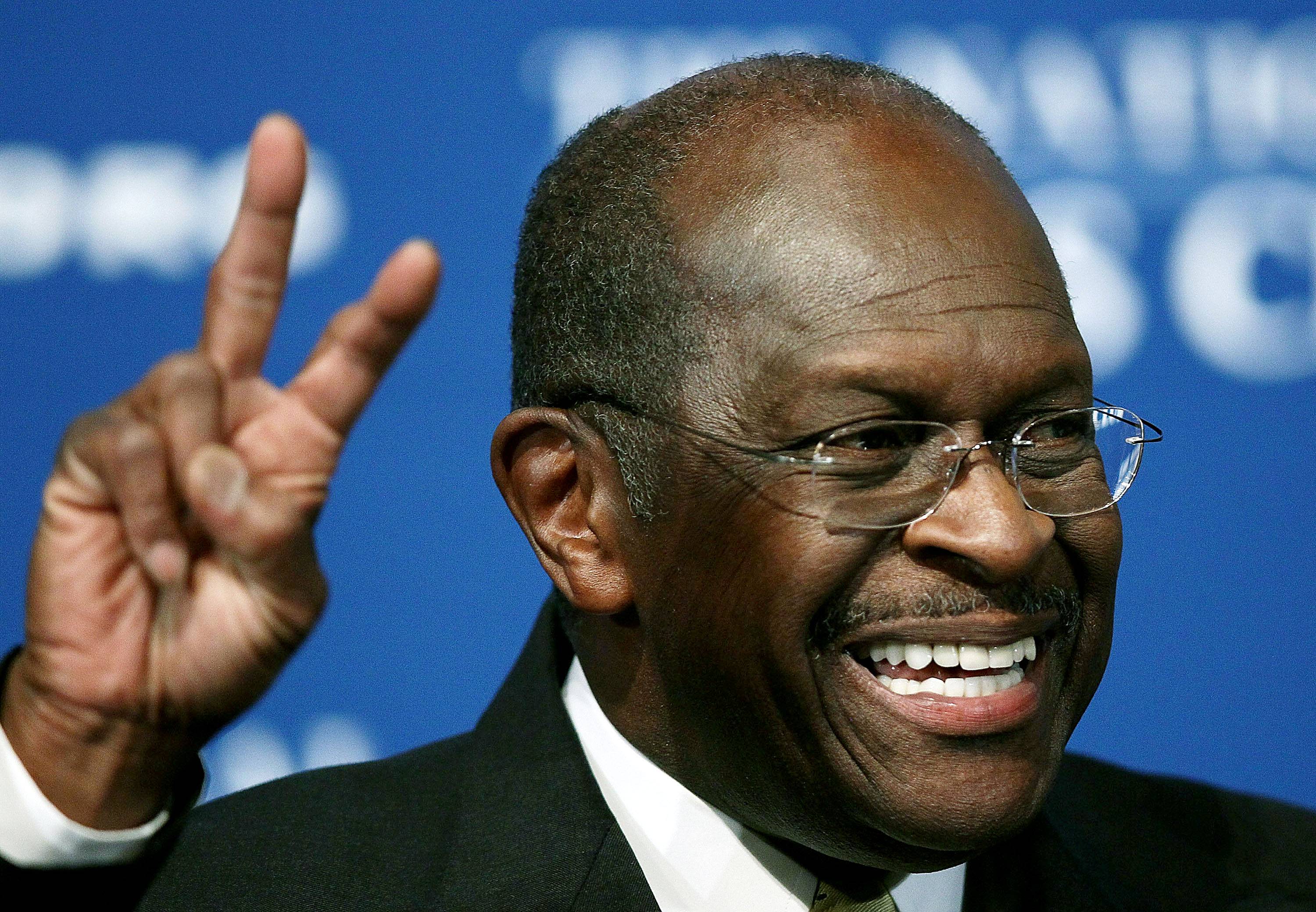 Herman Cain Promotes Tax Plan, Denies Sexual Allegations and Sings at ...