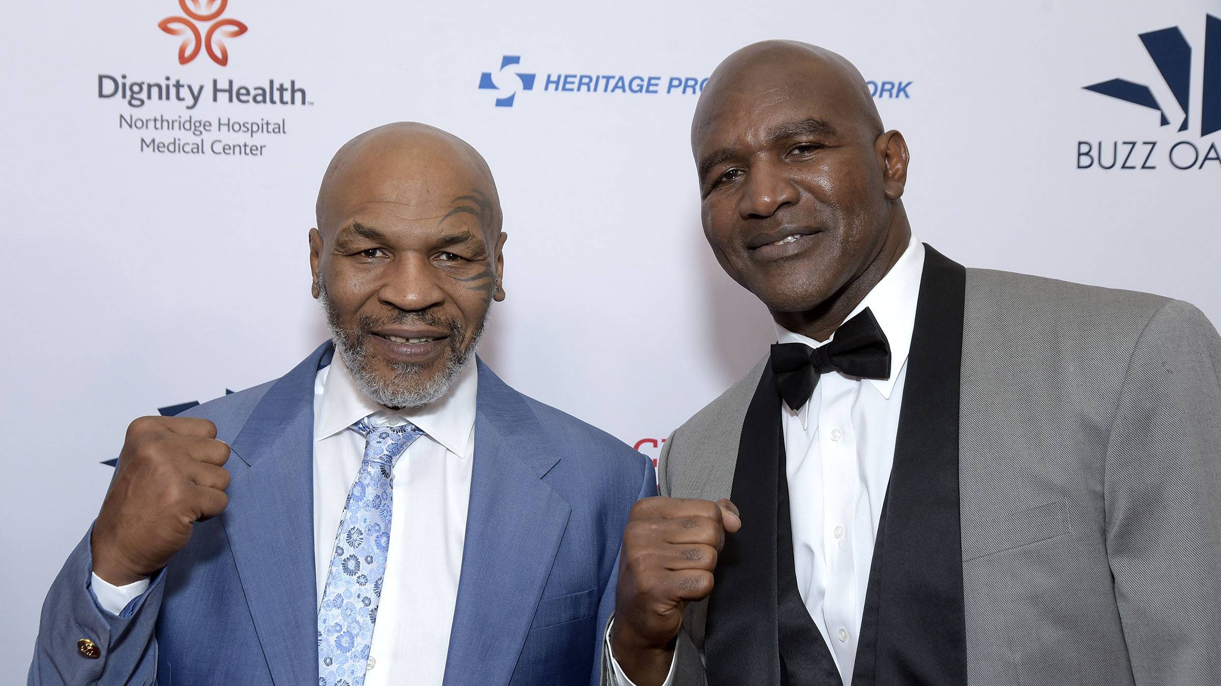 Former Boxing Heavyweight Champs Mike Tyson And Evander Holyfield Team ...