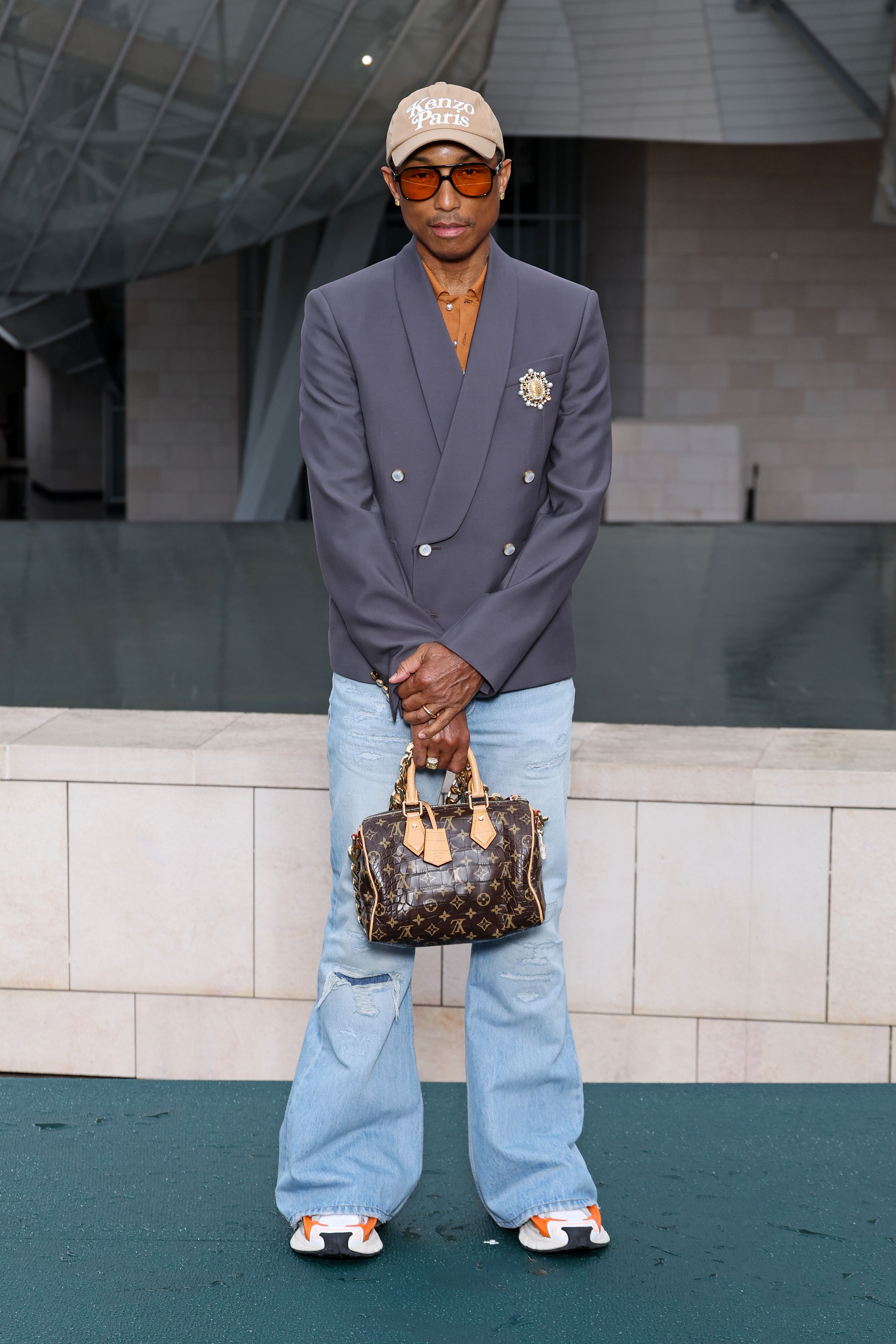 Pharrell Williams in a - Image 9 from Olympic Drip: See What Celebs and ...