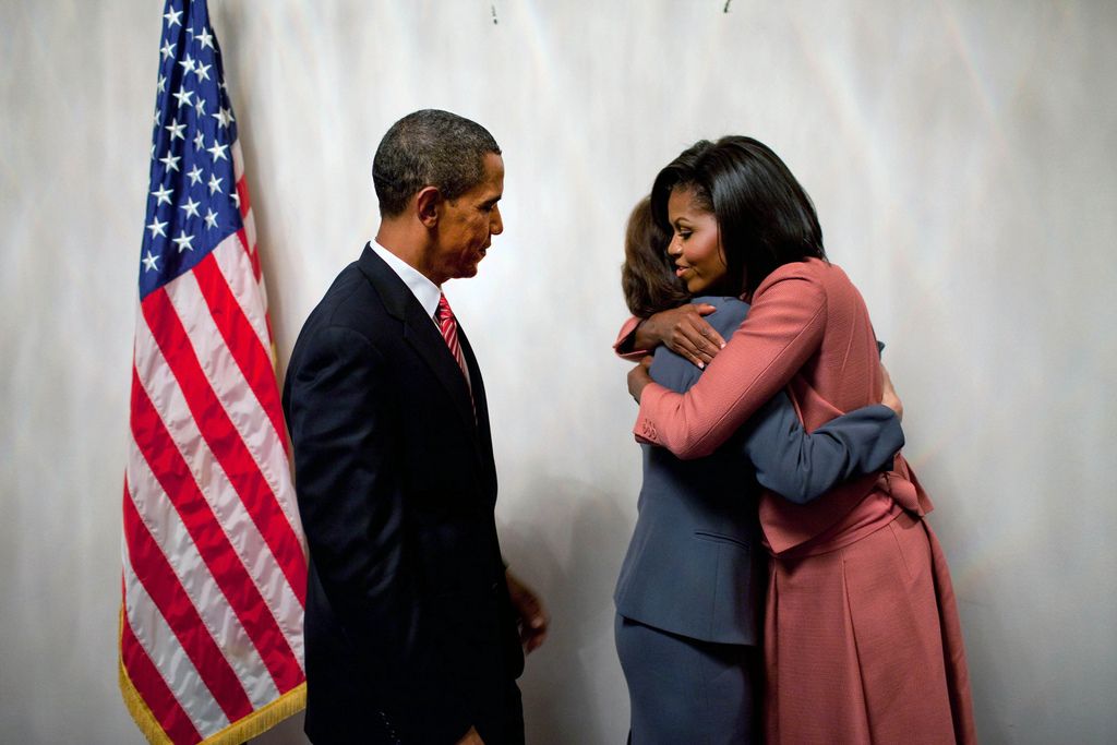 Health Care Hug - - Image 17 from Photos: The Many Hugs of Michelle ...
